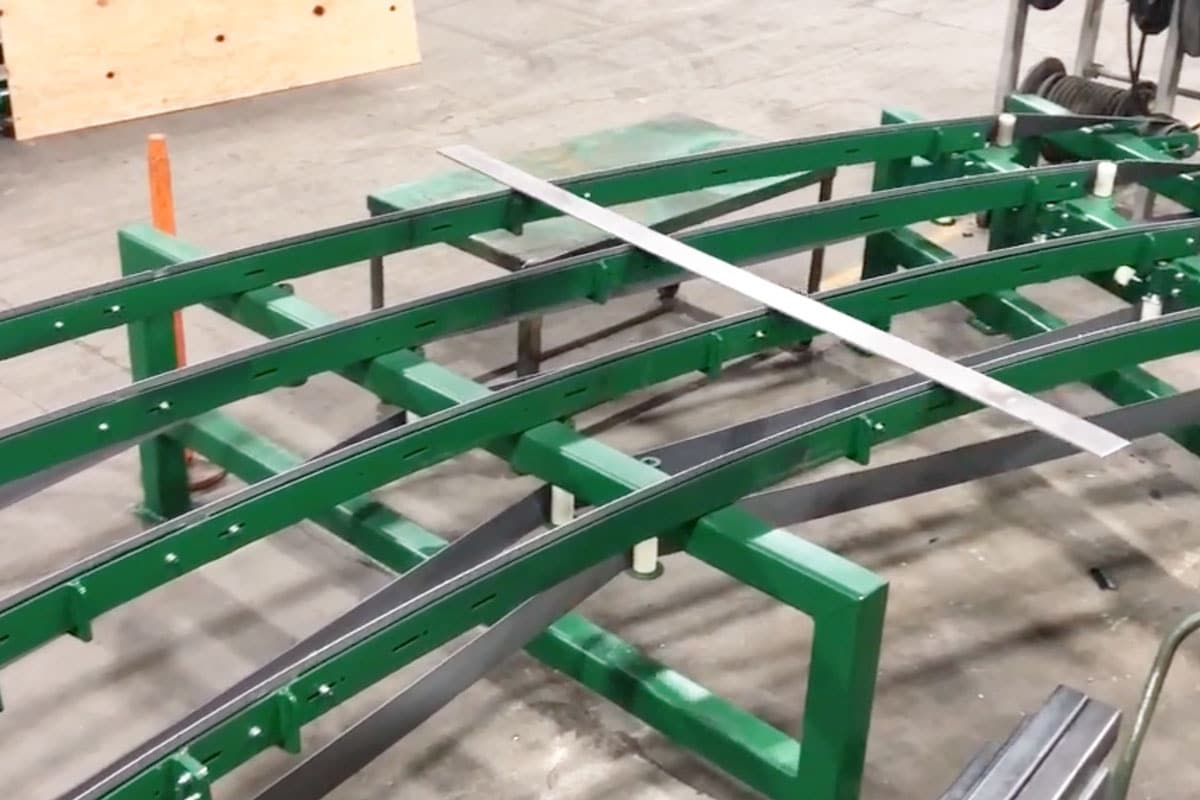 Boost Veneer Mill Production with SWEED's Right Angle Conveyor